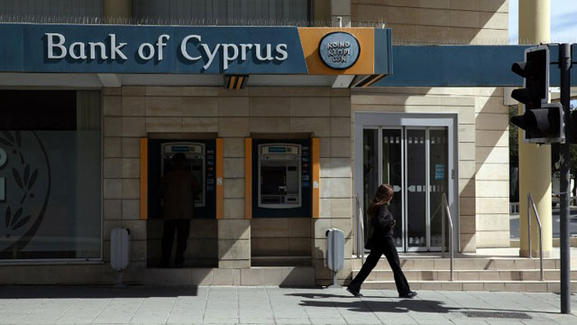 Cyprus banks to stay shut as world markets take fright