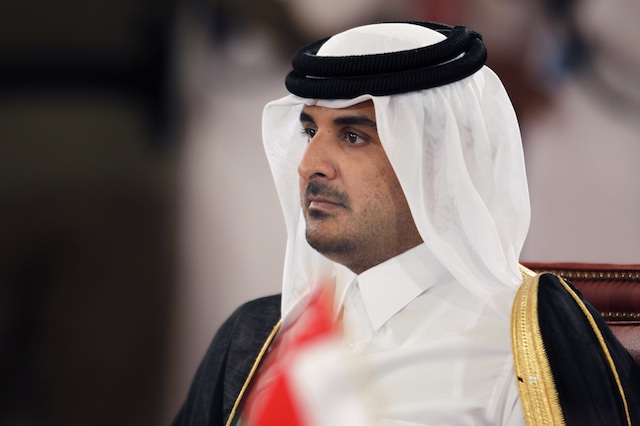 Qatar's emir hands power to his son